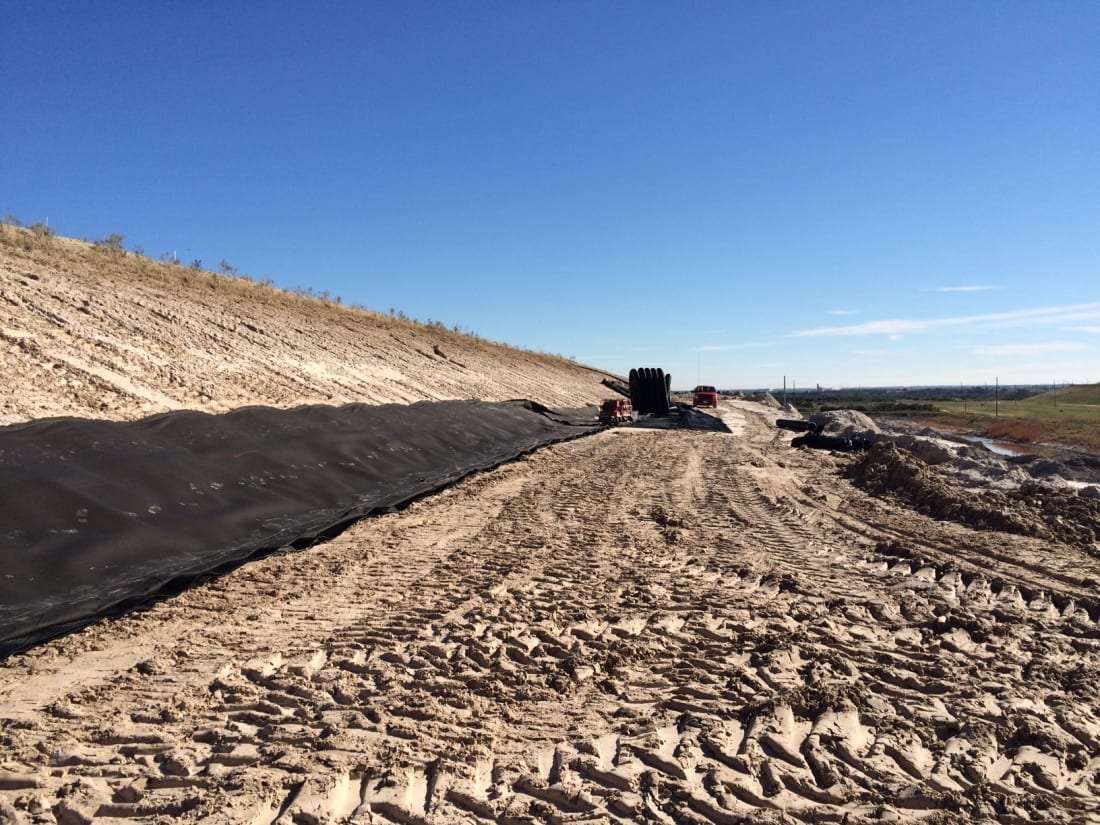 Upper Slope Drain Finished on Gyp Stack Closure Project | COMANCO
