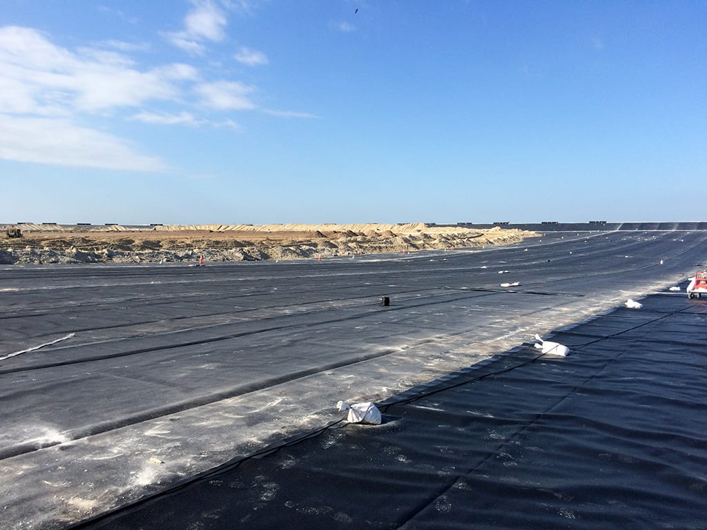 COMANCO Continues Liner Installation on Gyp Stack | COMANCO