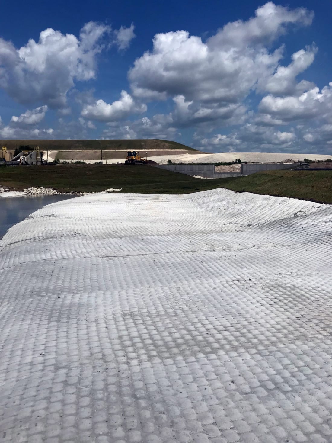 COMANCO Completes Spillway for New Stormwater Drainage Outfall | COMANCO